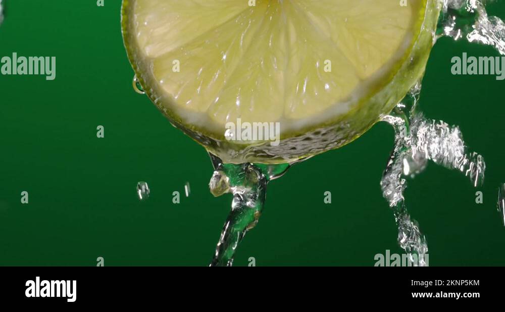 Water running down fresh pulp of lime. Citrus fruit rich in vitamin c ...