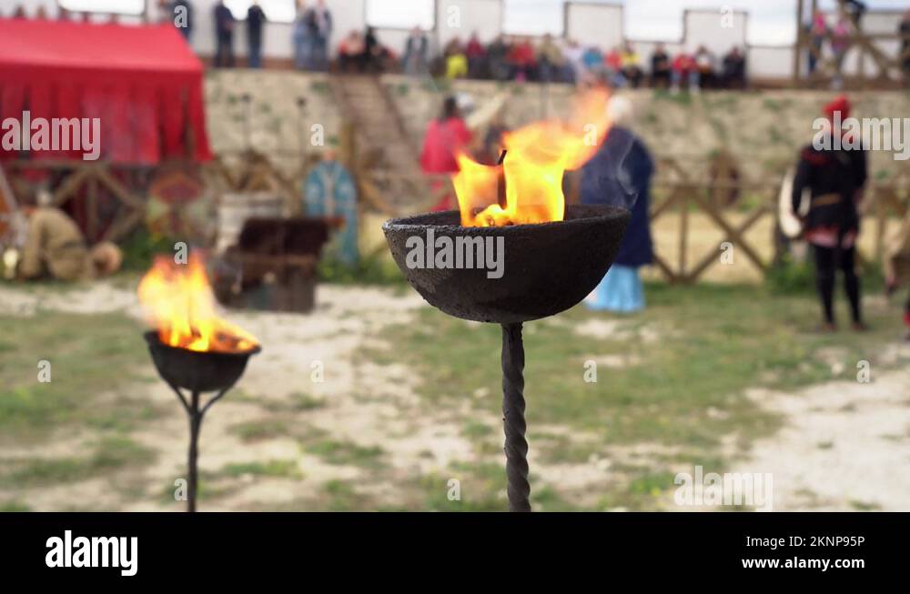Gladiator Show in Ancient Rome. Burning torch. A Roman gladiator was an ...