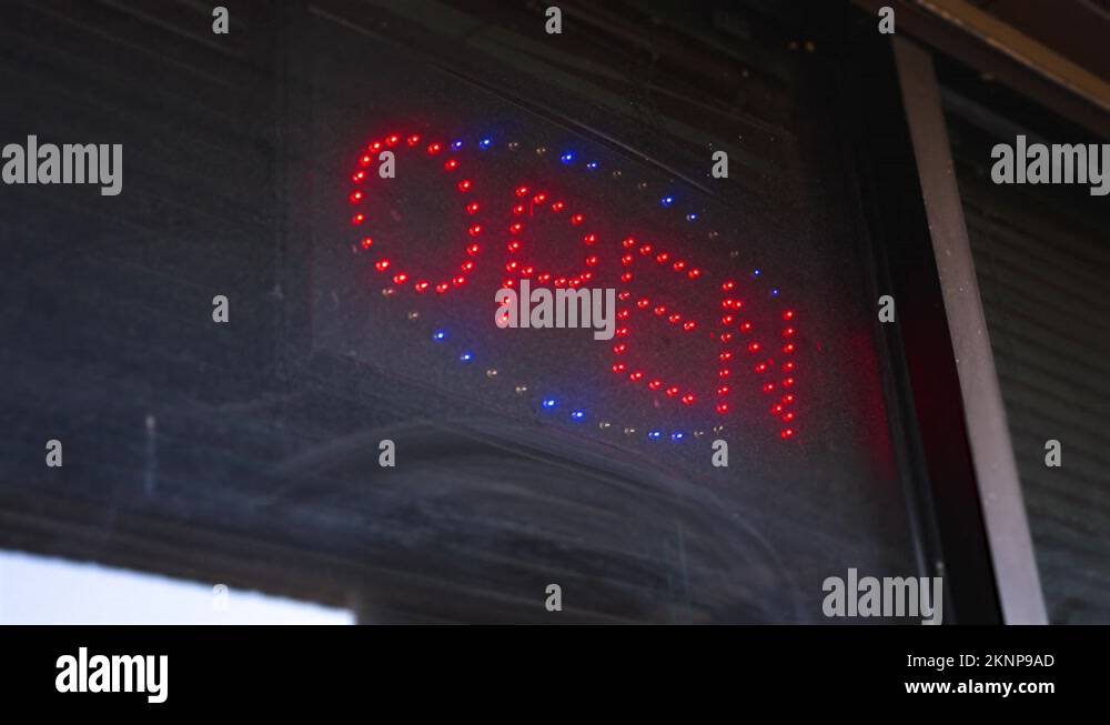 LED red and blue dot flashing OPEN sign, 4K Stock Video Footage - Alamy