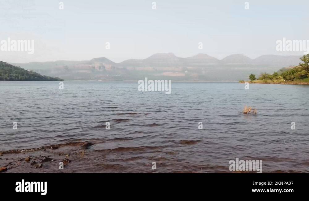 Travel Over Lake Water in India - Mulshi dam, Pune surrounded with ...