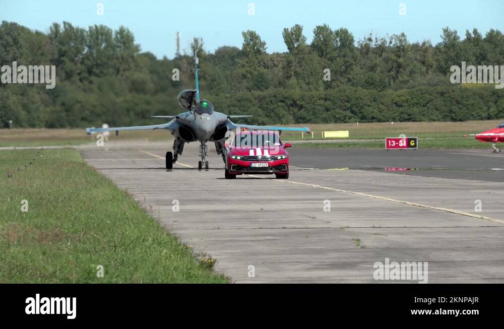 RAFALE SOLO DISPLAY - Red Car Driving In Front Of Dassault Rafale ...