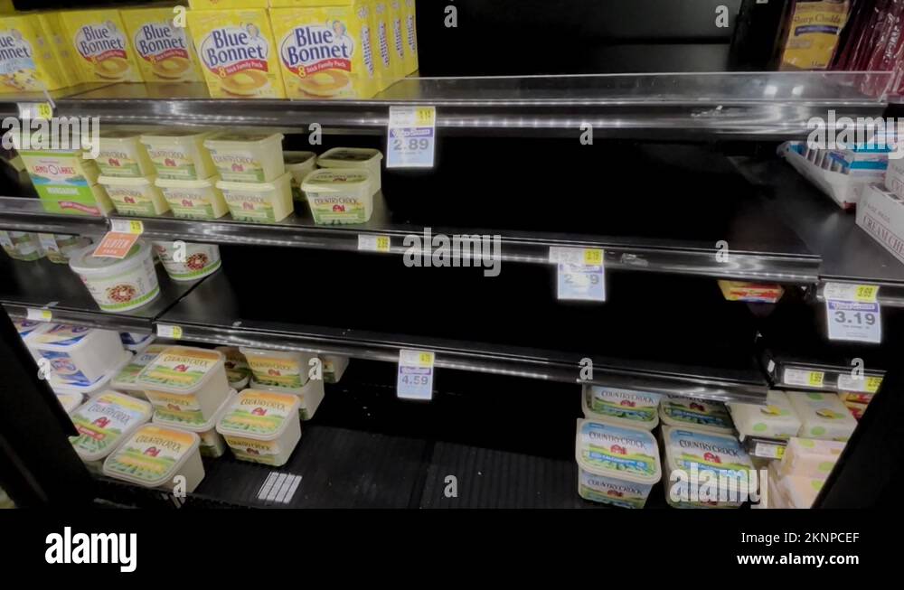 KJs Retail grocery store tilt of empty shelves in butter section Stock ...