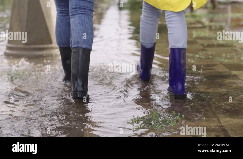 Puddles and boots Stock Videos & Footage - HD and 4K Video Clips - Alamy