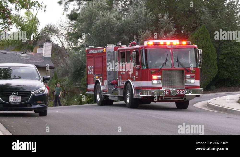 fire engine arriving to battle heavy fire Stock Video Footage - Alamy
