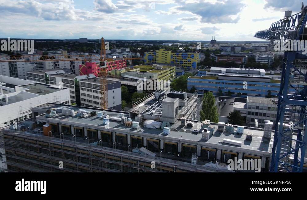 tower crane, blue, Aerial drone in 4k, suburban city background ...