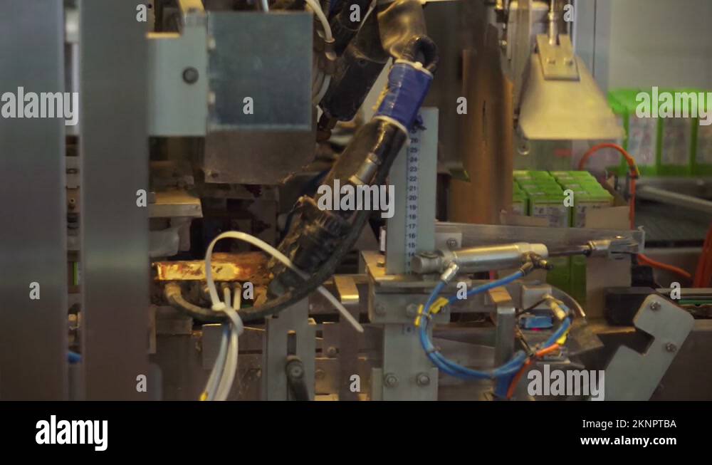 Packaging Process. Ready Made Milk Cartons Places in a Box. Advanced ...