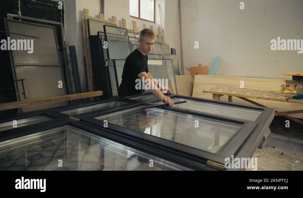 Craftsman is connecting multiple pieces of the window frame in the ...