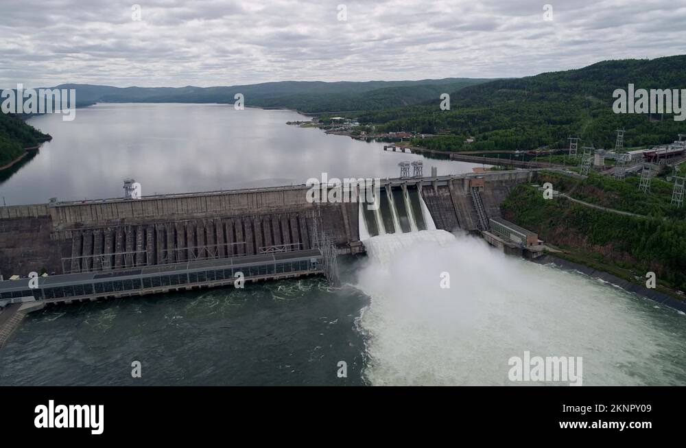Aerial view of water discharge at hydroelectric power plant of ...