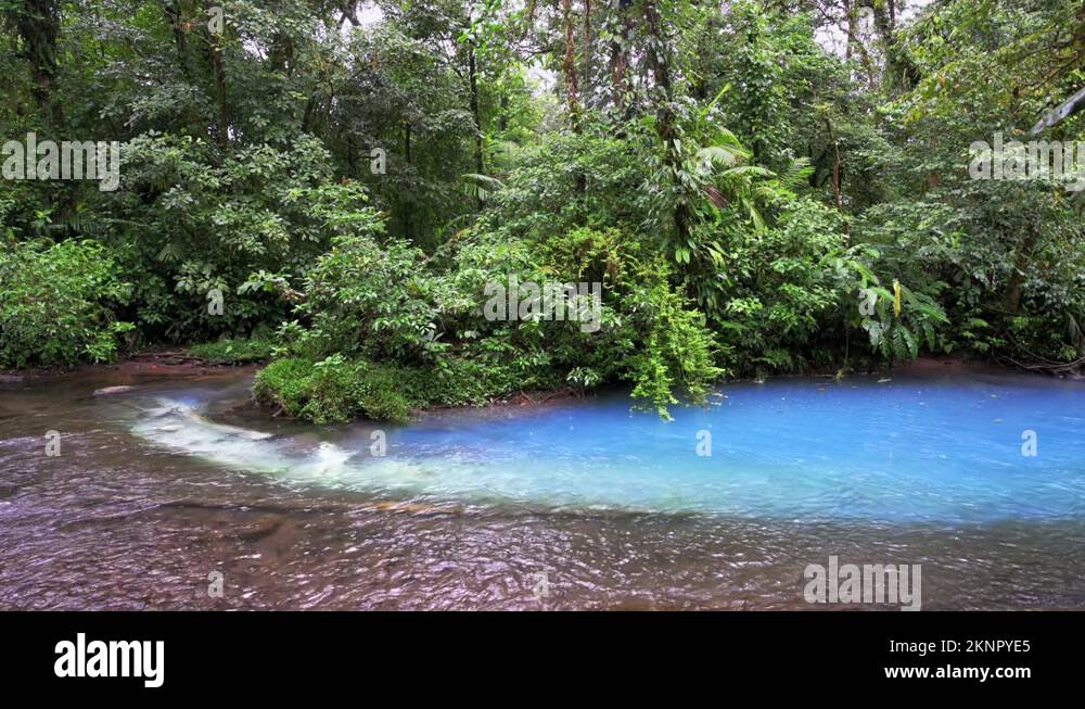 the confluence of two rivers the blue river Rio Celeste is formed Stock ...