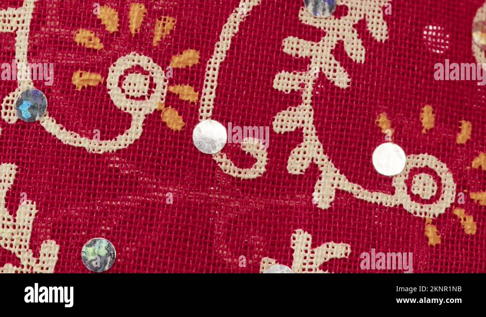 Red indian fabric close-up, arabian design, pattern. Cloth texture ...