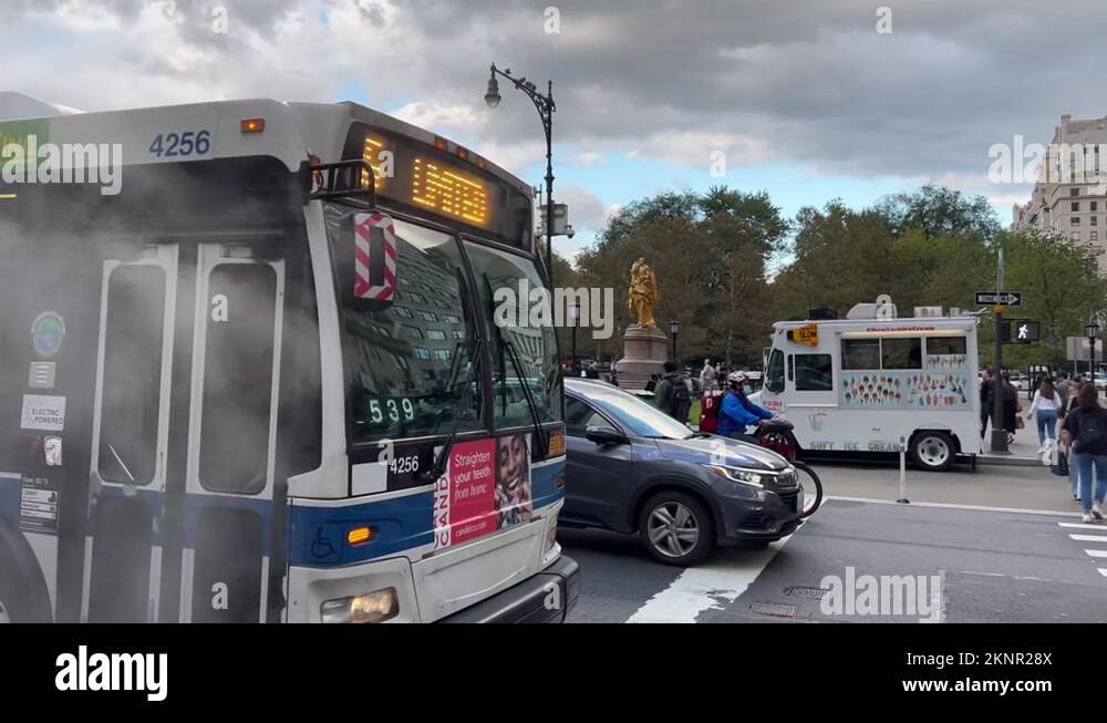 MTA City buses driving along the route. Fifth Avenue in New York Stock ...