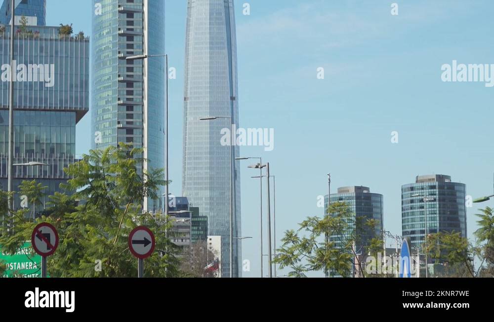 Tilt down of Titanium La Portada and Gran Torre Santiago skyscrapers ...