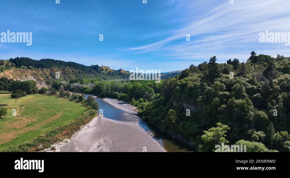 Flight up the Pohangina River, forests, and bush-clad cliffs - New ...