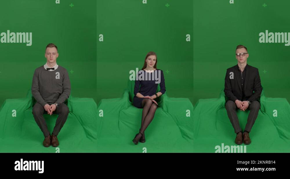 GREEN SCREEN CHROMA KEY Spectators wearing formal attire watching ...