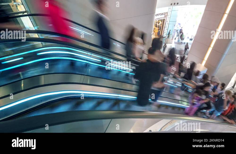Rush hour timelapse of people move fast on escalator in shopping mall. Urban Stock Video Footage ...