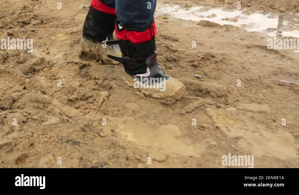 Walking in the mud Stock Videos & Footage - HD and 4K Video Clips - Alamy