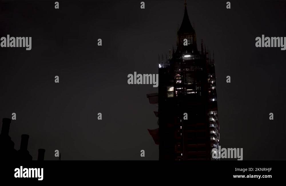 Silhouette of Big Ben surrounded by scaffolding during the night ...