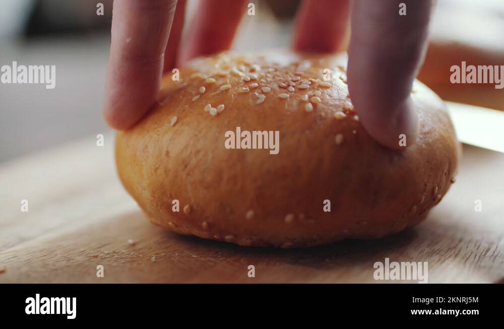 Burger in bun Stock Videos & Footage - HD and 4K Video Clips - Alamy