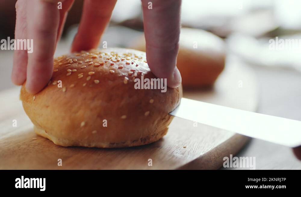 Cutting burger Stock Videos & Footage - HD and 4K Video Clips - Alamy