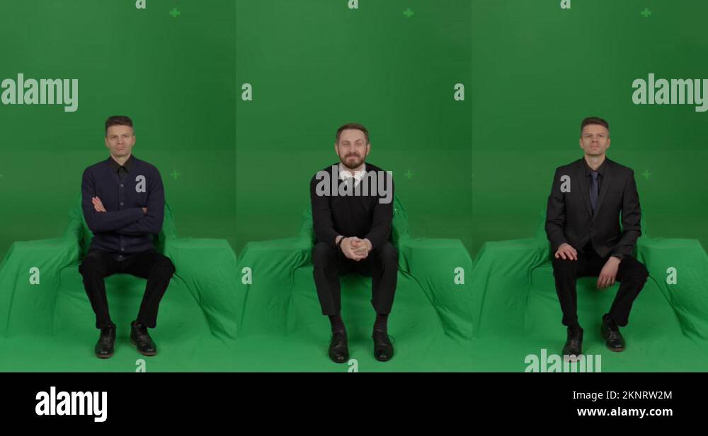 GREEN SCREEN CHROMA KEY Spectators wearing formal attire watching ...