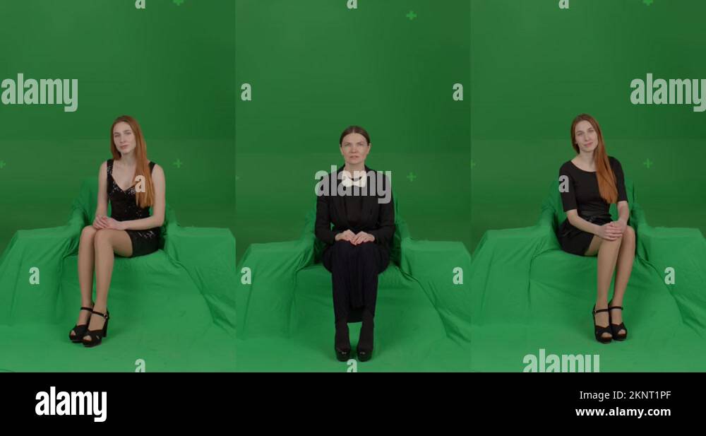 GREEN SCREEN CHROMA KEY Spectators wearing formal attire watching ...