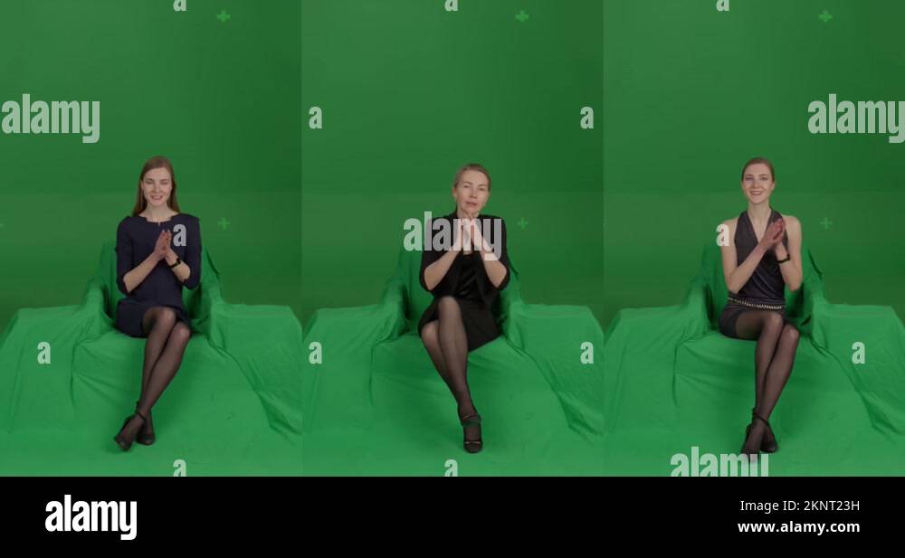 GREEN SCREEN CHROMA KEY Spectators wearing formal attire applaud at ...