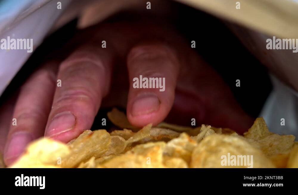 Bag of chips hand Stock Videos & Footage - HD and 4K Video Clips - Alamy
