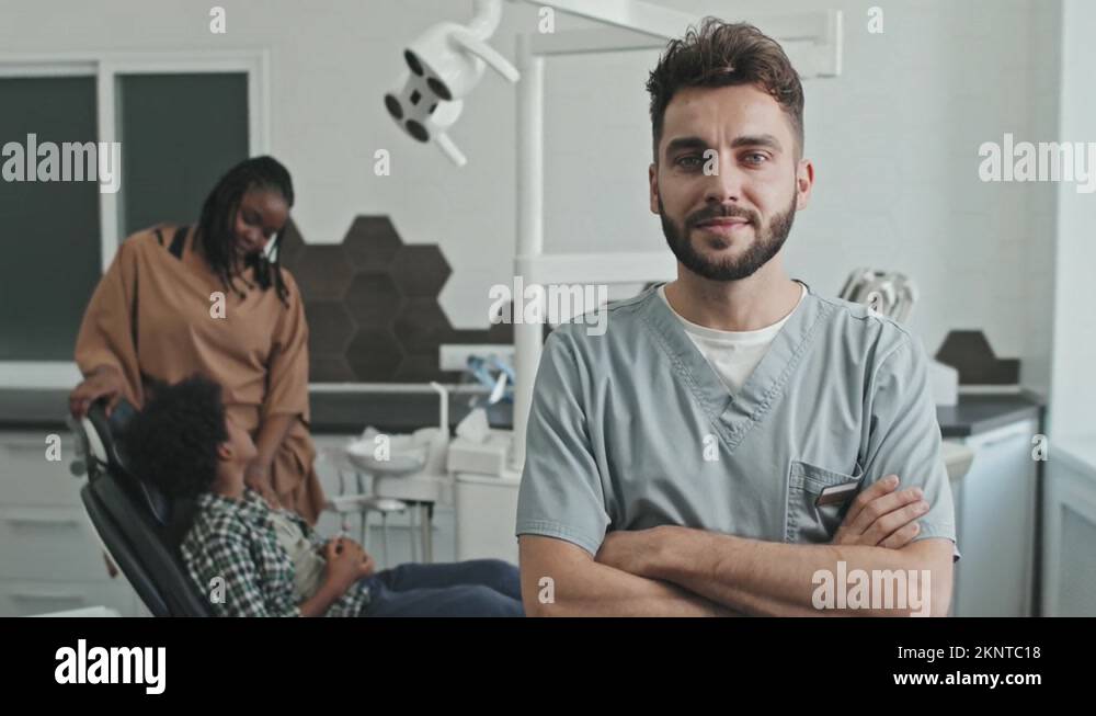 Dentist Posing in Medical Office Stock Video Footage - Alamy