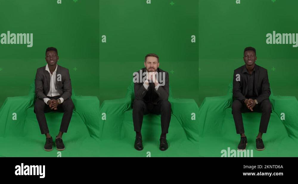 GREEN SCREEN CHROMA KEY Spectators wearing formal attire watching ...