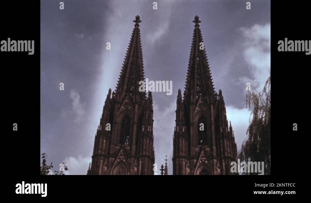 1960s: Medieval cathedral exterior with double spires. Exterior church ...