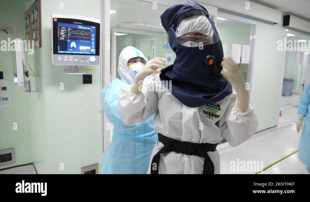 Medic Staffs Putting On PAPR (Powered Air Purifying Respirators) Suits ...