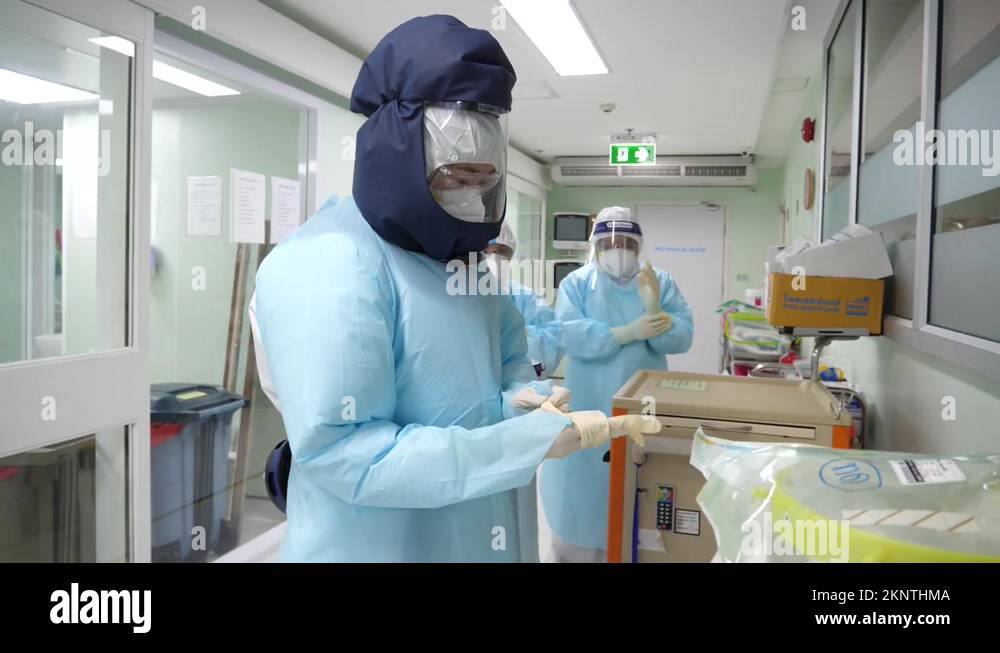 Medic Staffs Putting On PAPR (Powered Air Purifying Respirators) Suits ...