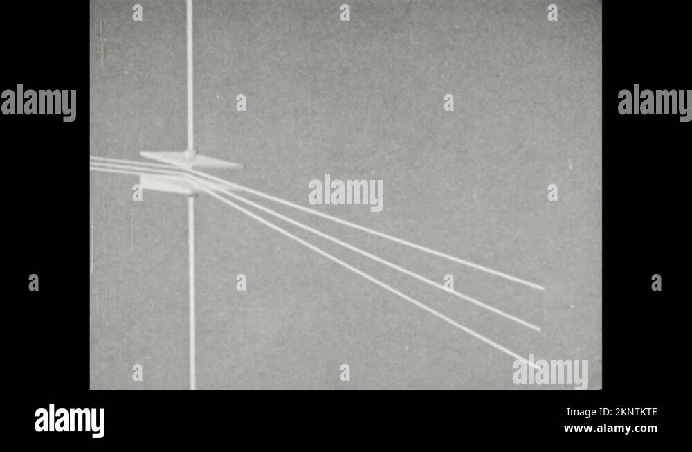 1940s: Animated radiation particles pass through field on mass ...