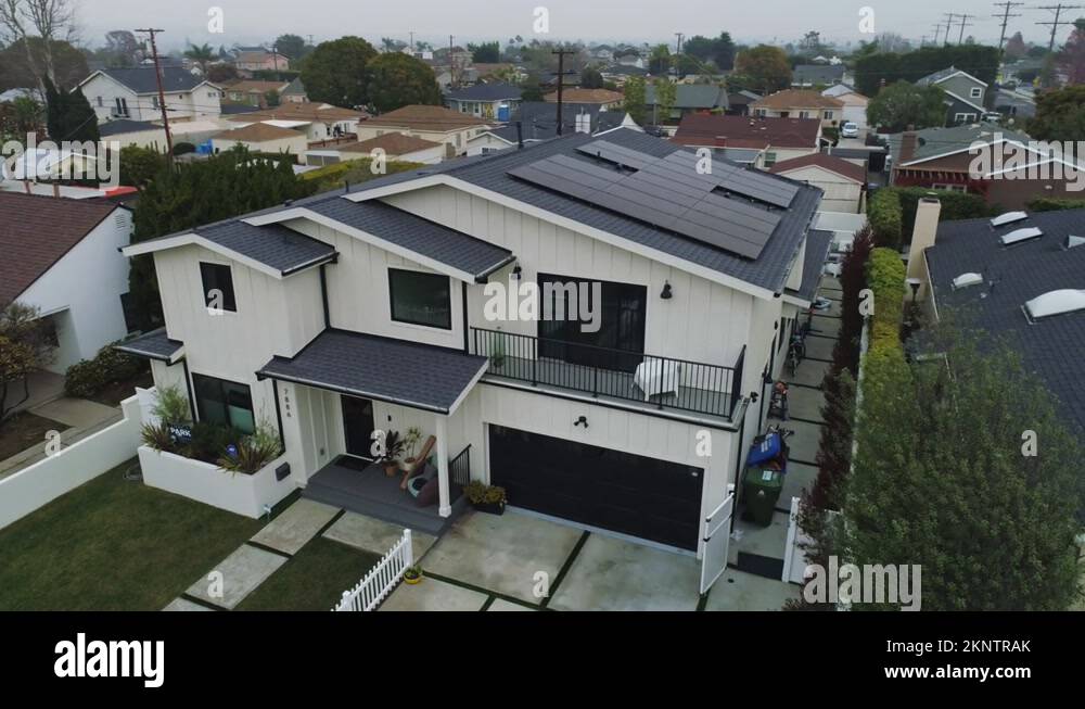 Orbit around Los Angeles house with solar panels installed on rooftop ...
