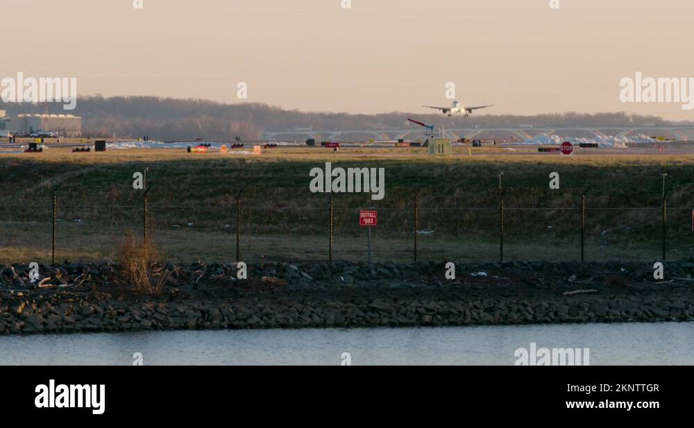 Commercial Jet Landing With Water In Foreground At Washington D.C.’s ...