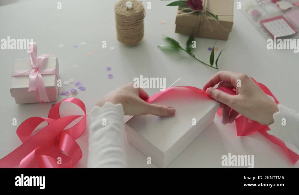 Ribbon around box Stock Videos & Footage - HD and 4K Video Clips - Alamy