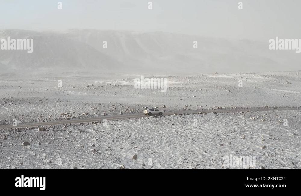 Side Pan Aerial of an off Road Vehicle Driving through F Road during a ...