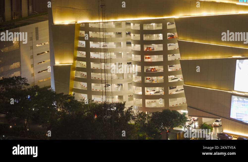 Crowd of cars with traffic jam in parking lots in shopping mall or ...