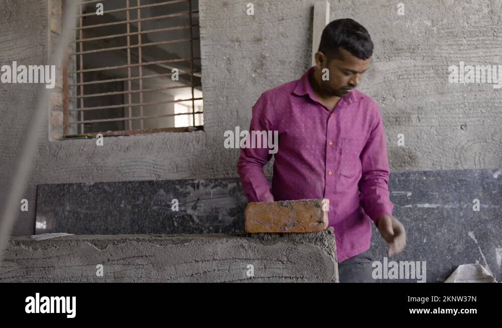Manual worker constructing Stock Videos & Footage - HD and 4K Video ...