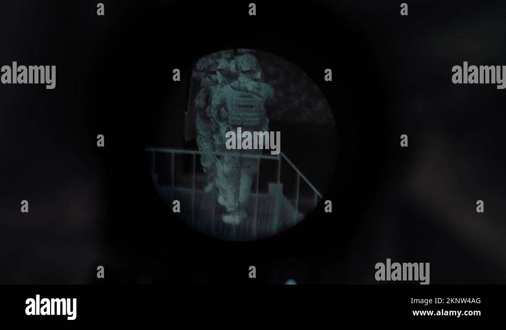 Night vision sniper scope, sniper sits in ambush on the rooftop Stock ... Night vision sniper scope, sniper sits in ambush on the rooftop Stock ...