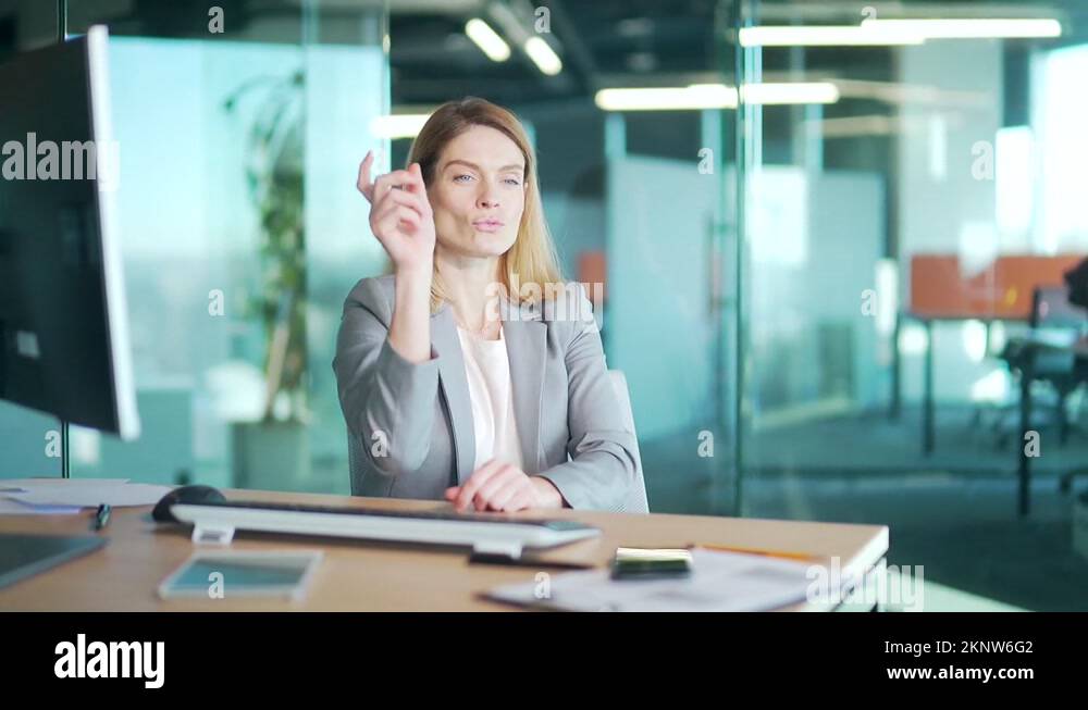 woman is bored at work, does nothing to do the office worker has ...