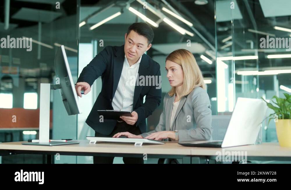 Business people pointing at monitor Stock Videos & Footage - HD and 4K ...