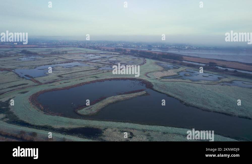 Misty Sunrise over Wetlands and meadows in RSPB Exminster and Powderham ...