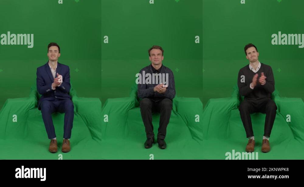 GREEN SCREEN CHROMA KEY Spectators wearing formal attire watching ...