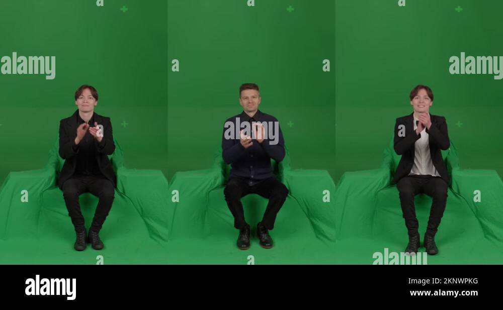 GREEN SCREEN CHROMA KEY Spectators wearing formal attire applaud at ...