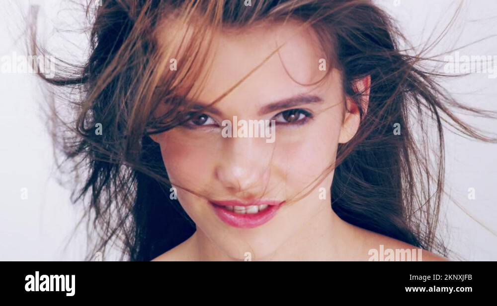 Thanks to my hair care I can flick my hair. 4k video footage of a ...