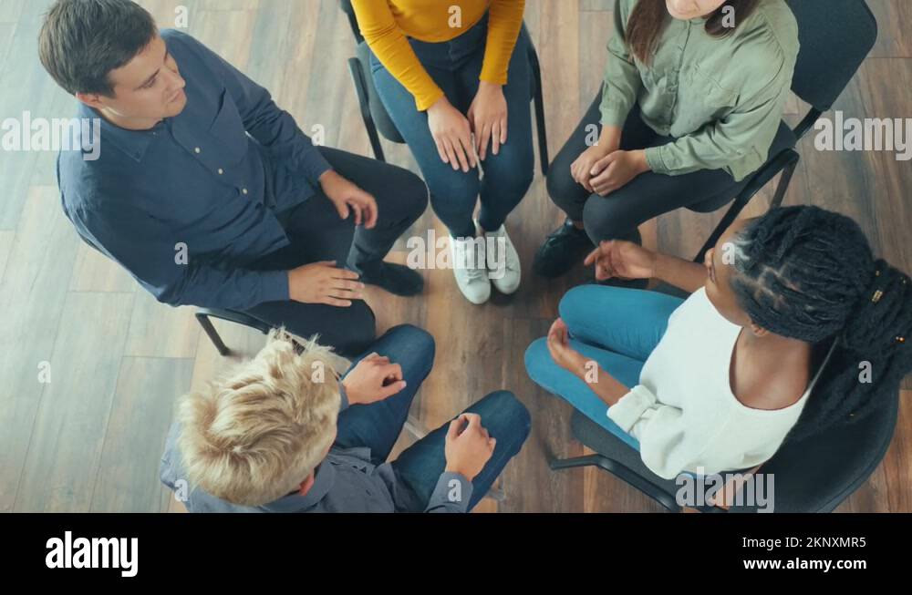 View From Above. A Group of People Join Hands in a Circle During a ...
