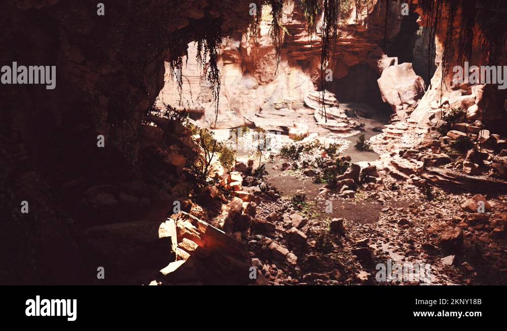 cave in an extinct volcano covered with grass and plants Stock Video ...