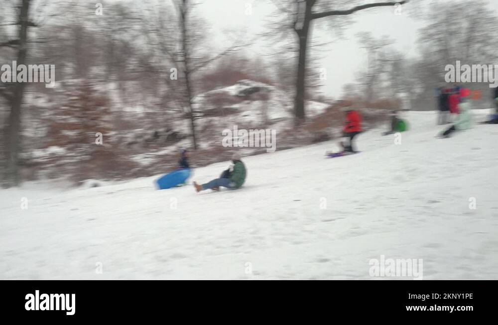 Crowd Of People Sledding In Central Park, New York City, On Big Snow ...