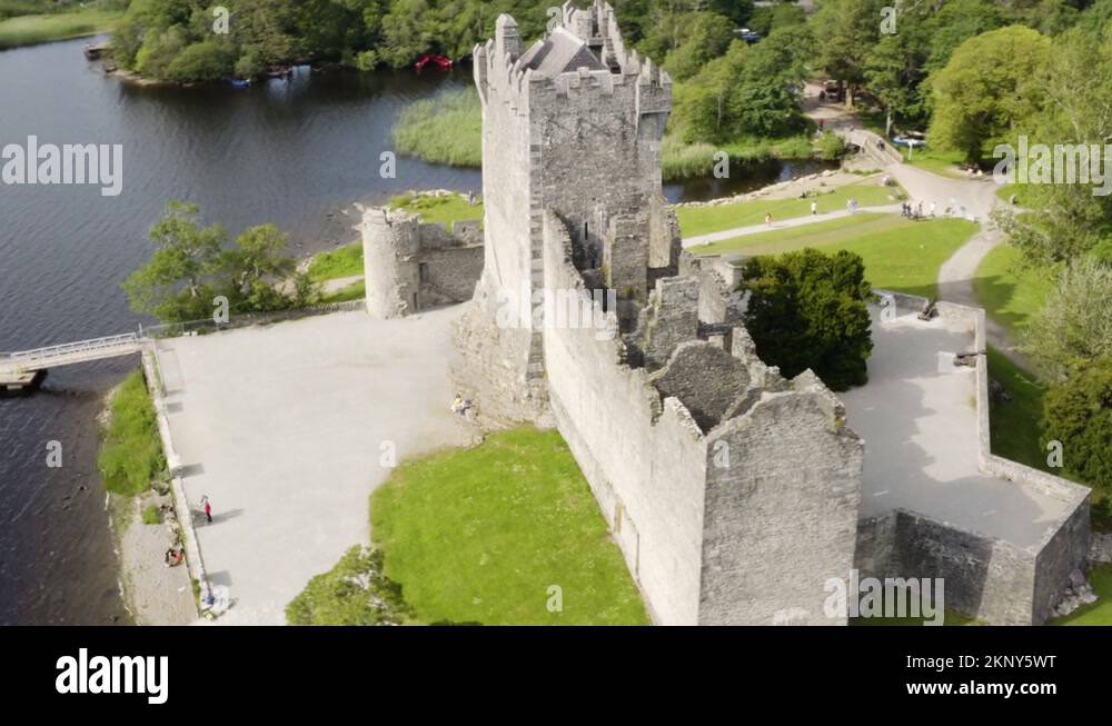 AERIAL - Ross Castle in Killarney National Park, Ireland, rising tilt ...